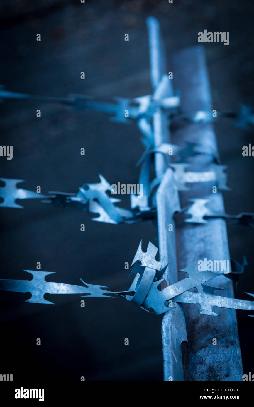 Ribbon Barbed Wire Stock Photo - Alamy