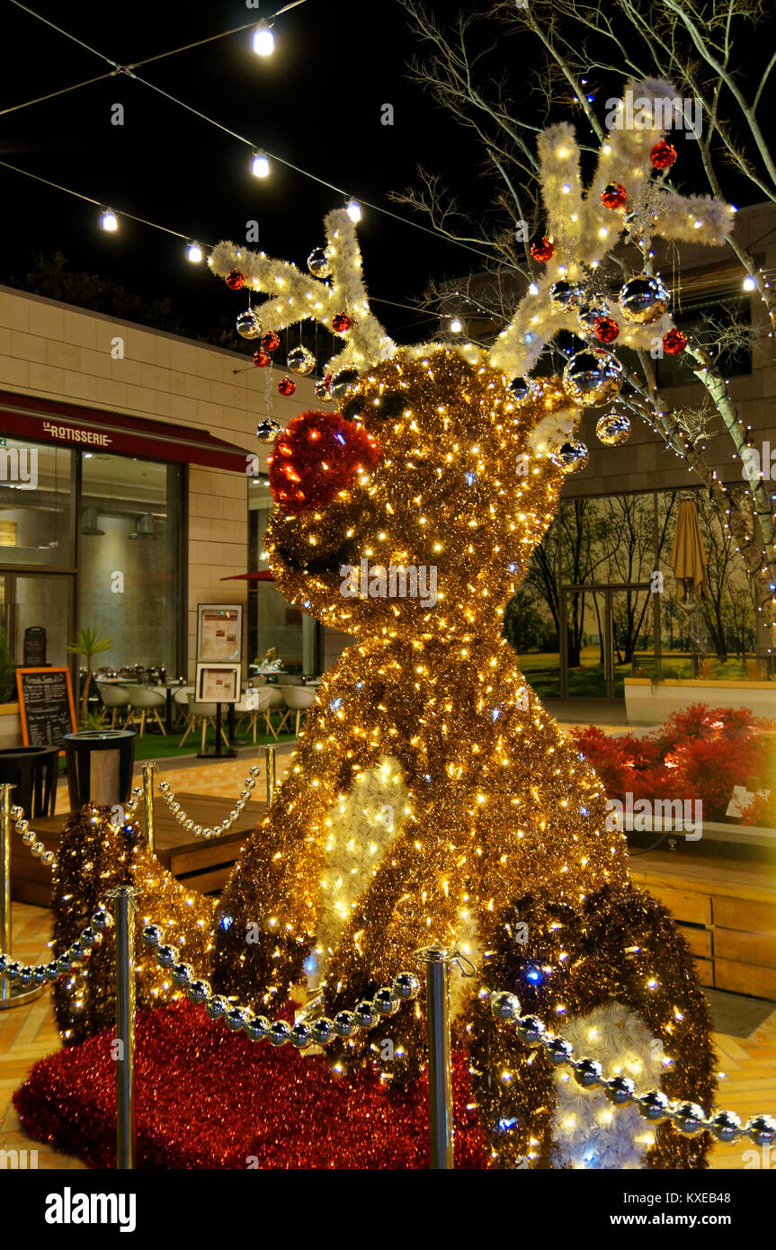 A Christmas reindeer make with lighting garland Stock Photo - Alamy