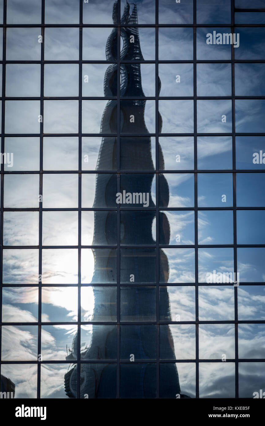 The Shard is reflected in the windows of a building producing a ...