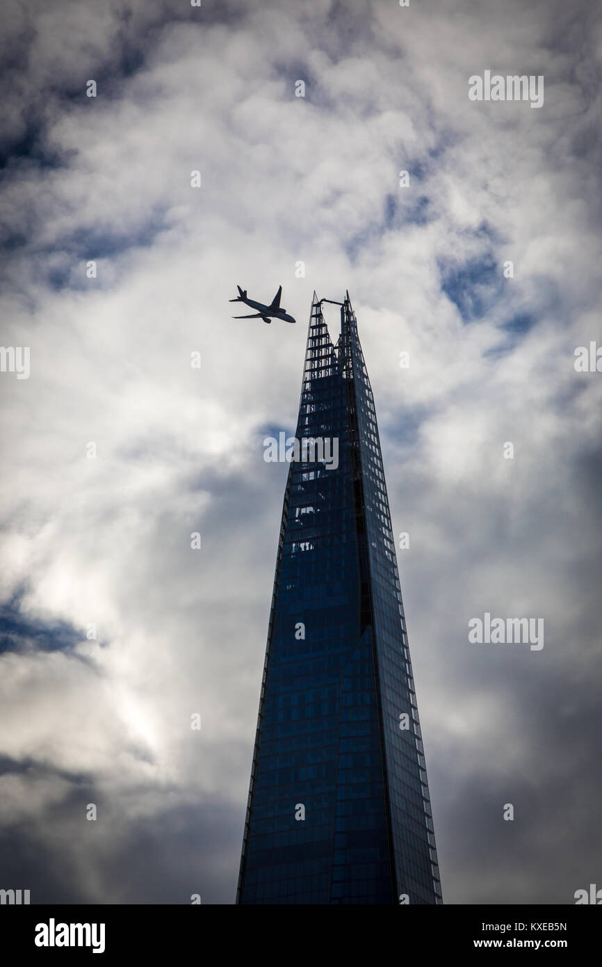 A plane appears to be on a collision course with the top of The Shard ...