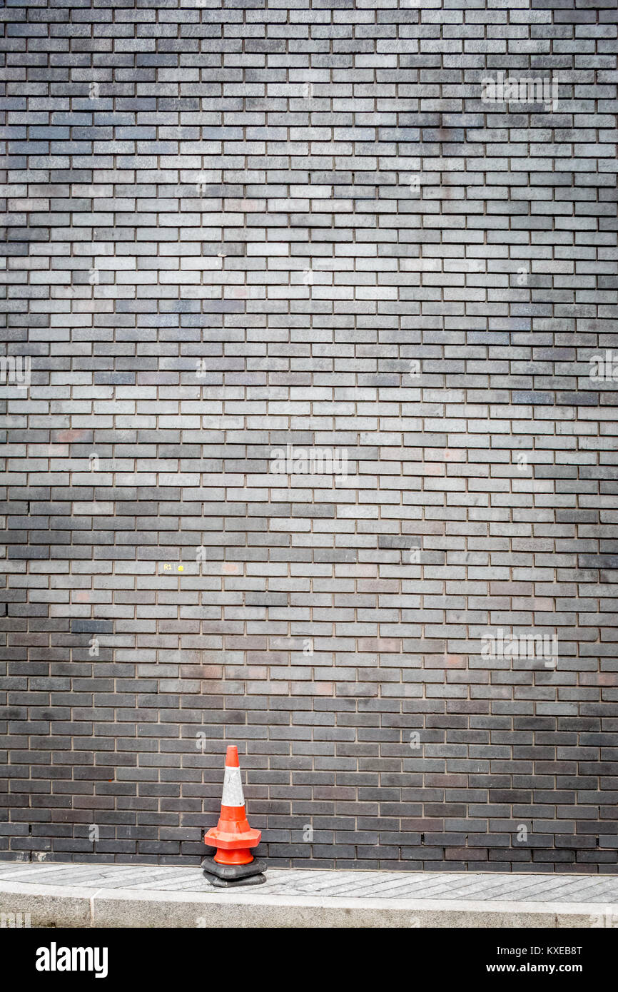 Traffic cone and brick wall High Resolution Stock Photography and ...