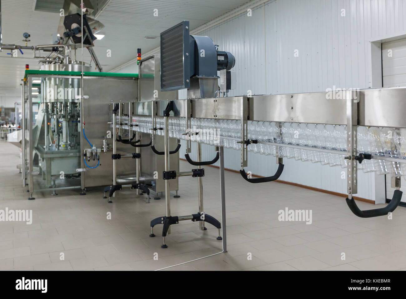 Clean bottles move on conveyor hi-res stock photography and images - Alamy