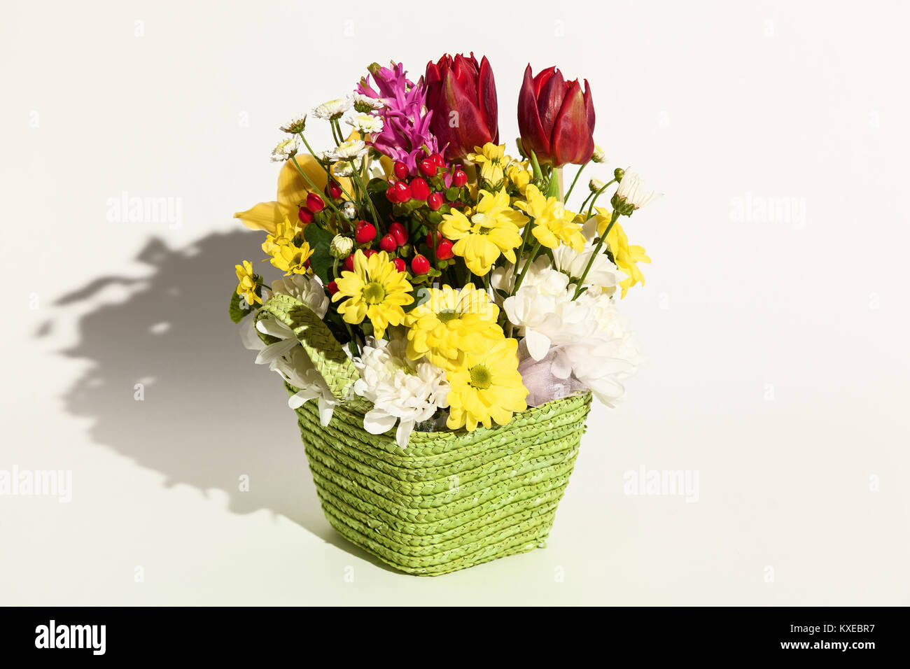 Yellow and red flowers bouquet isolated on white Stock Photo - Alamy