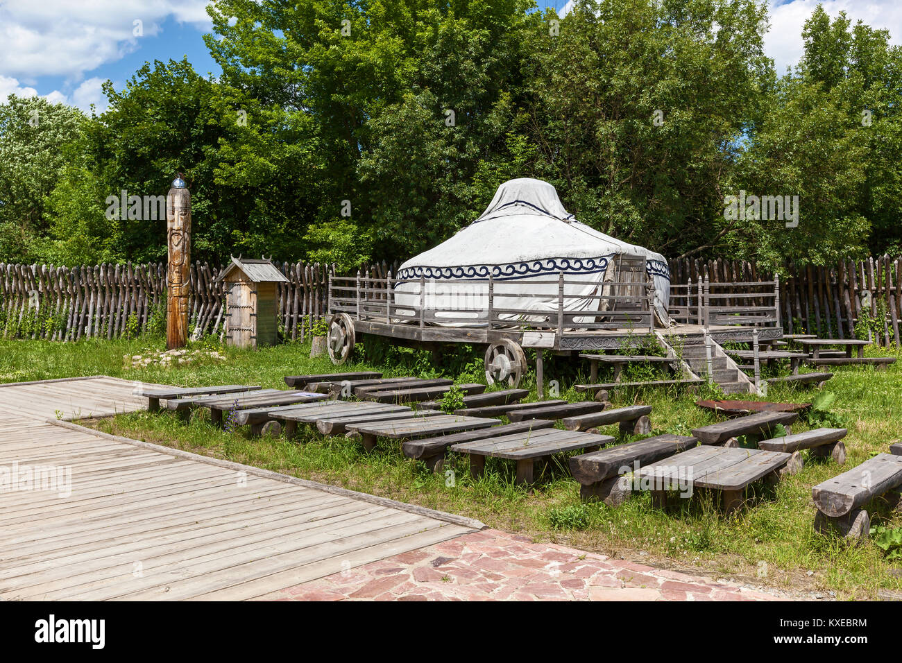 nomadic tent on a wooden podium on the background of trees. nomadic ...