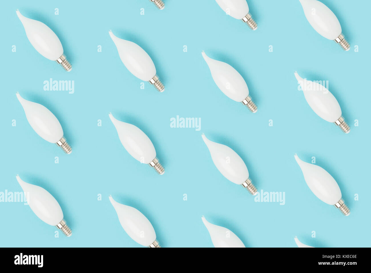 full frame on white light bulbs isolated on blue Stock Photo - Alamy