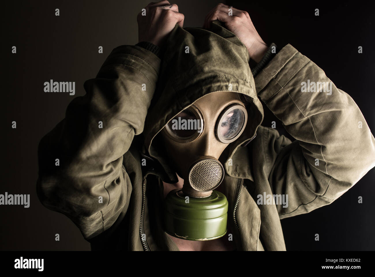 Studio shot depicting an post-apocalyptic scavenger in some underground ...