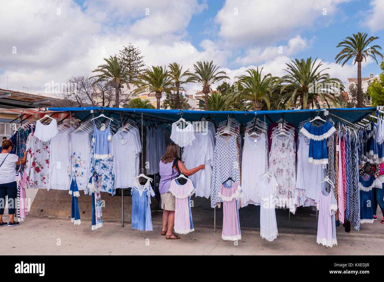 Clothes for sale at the street market in Mahon , Menorca , Balearic ...