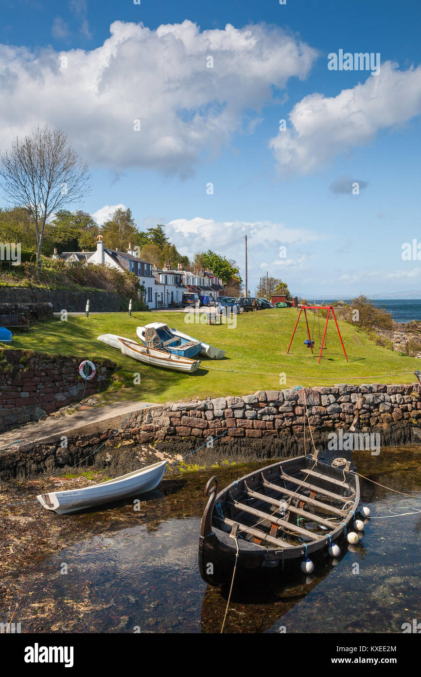 Boats moored at Corrie harbour and village, Isle of Arran, Scotland, UK ...