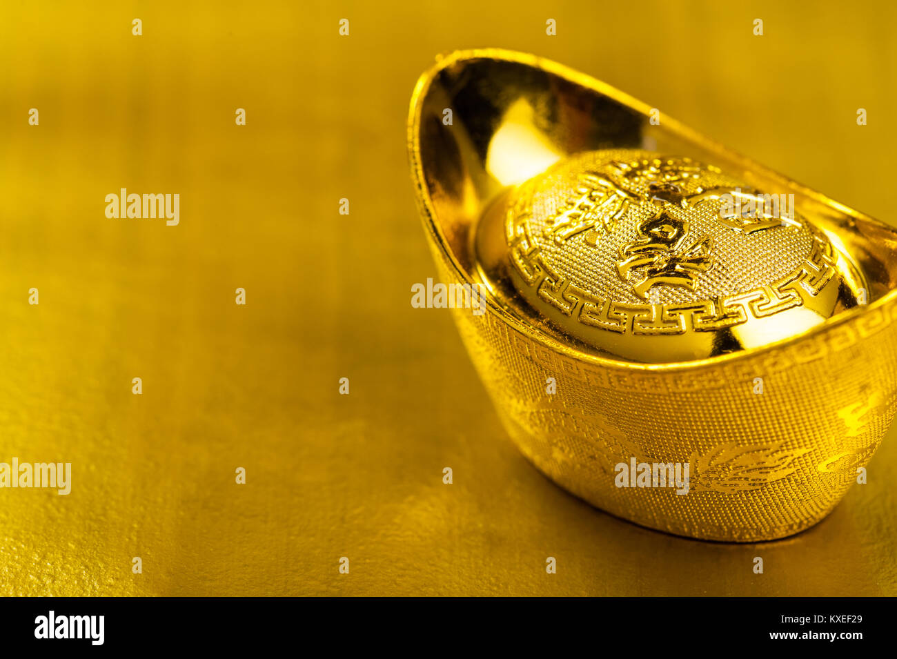 chinese gold ingot, chinese gold nugget Stock Photo - Alamy