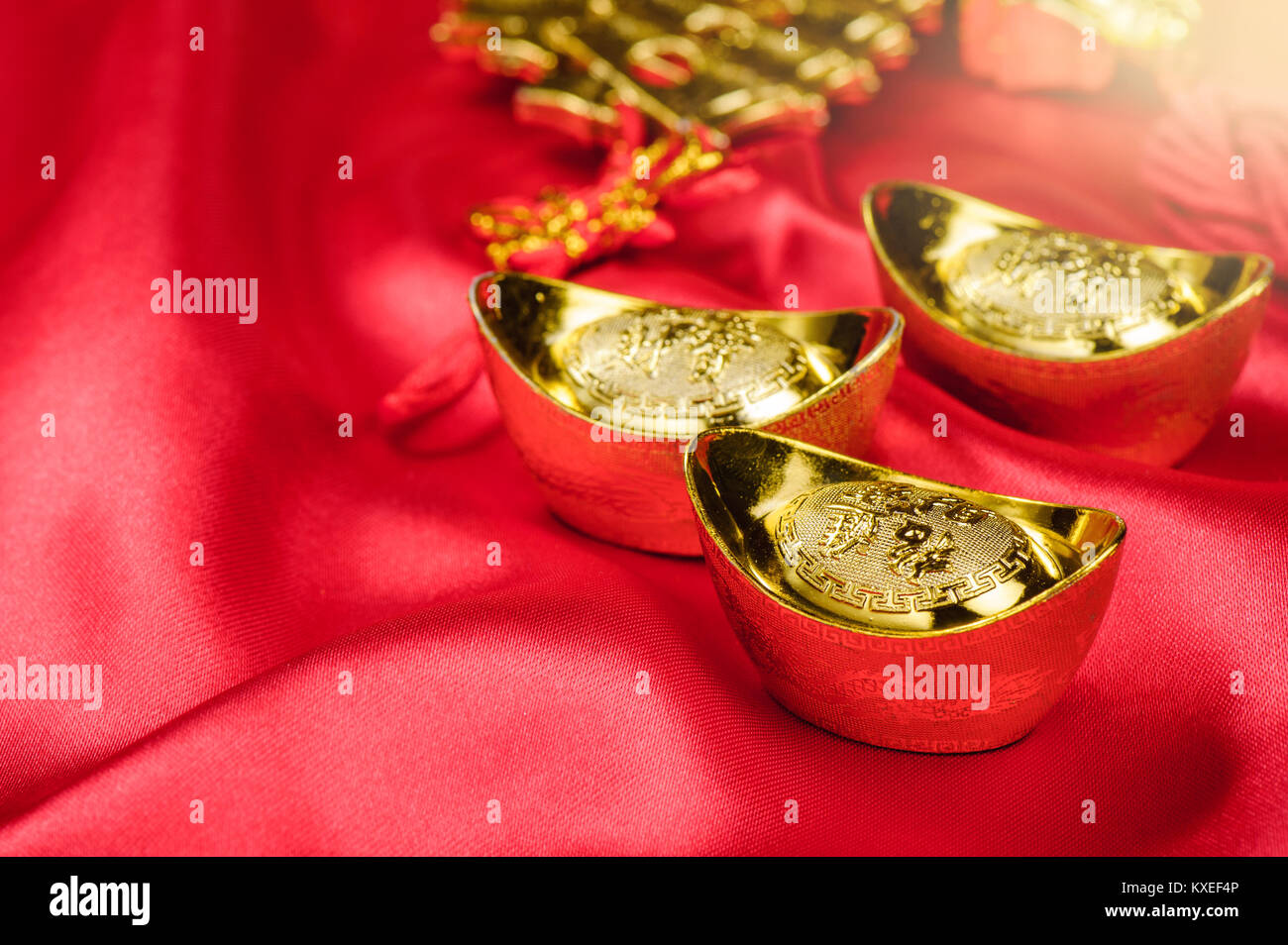 chinese gold ingot, chinese gold nugget Stock Photo - Alamy