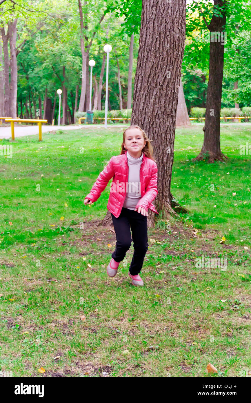 Photo of cute running girl in summer Stock Photo - Alamy