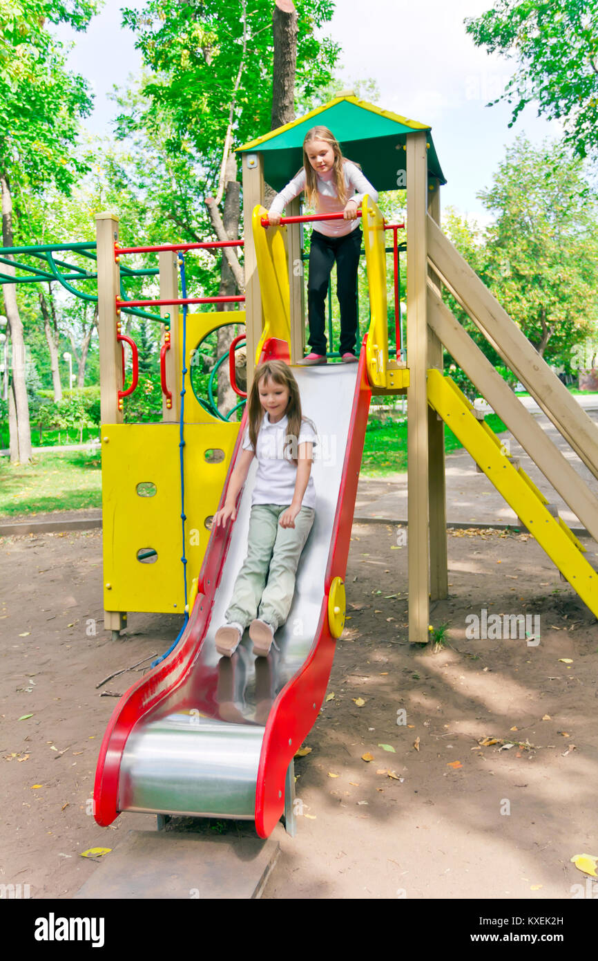 Photo of two active girls on nursery platform Stock Photo - Alamy