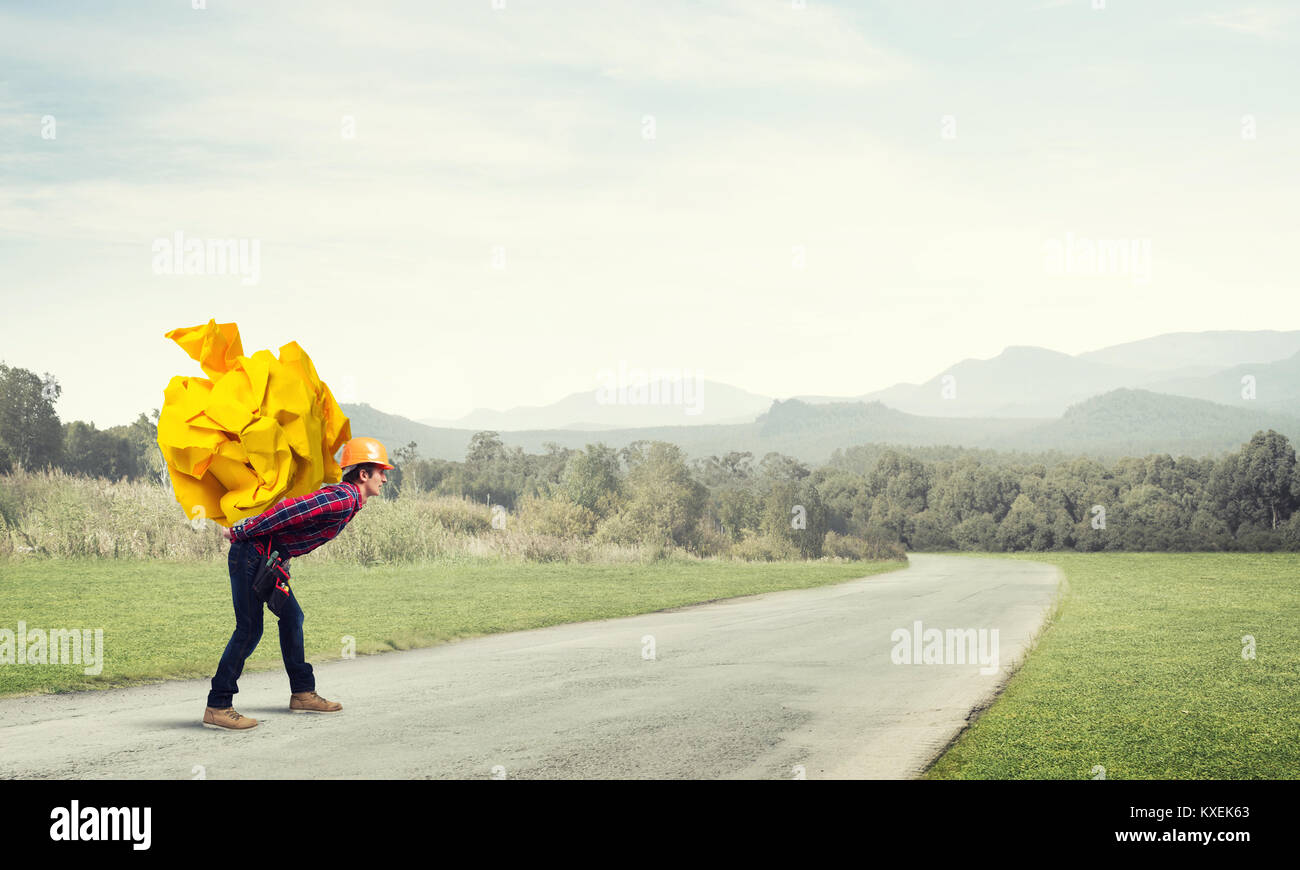 Engineer man carry load Stock Photo - Alamy