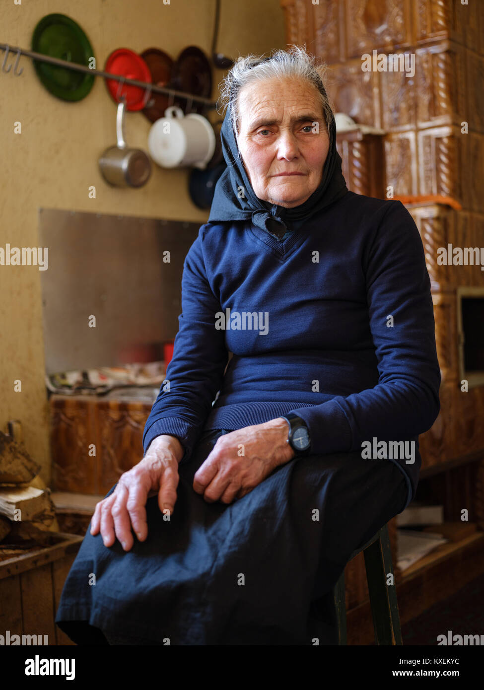 Old peasant woman in her house Stock Photo - Alamy
