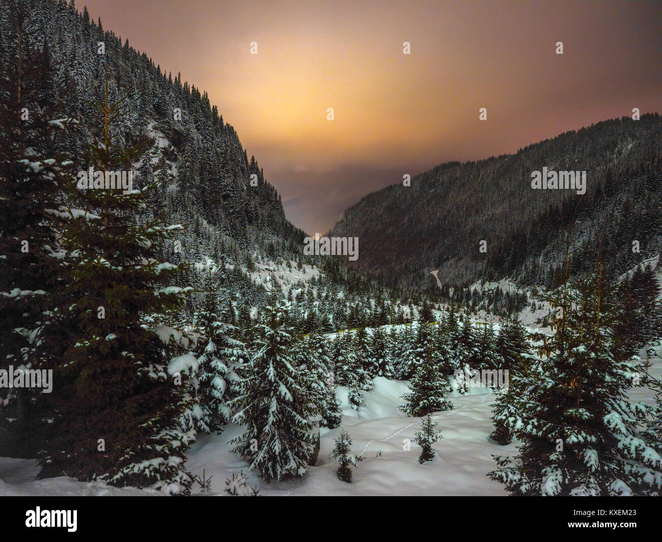 Alpine mountain landscape at night lit by light pollution only Stock ...