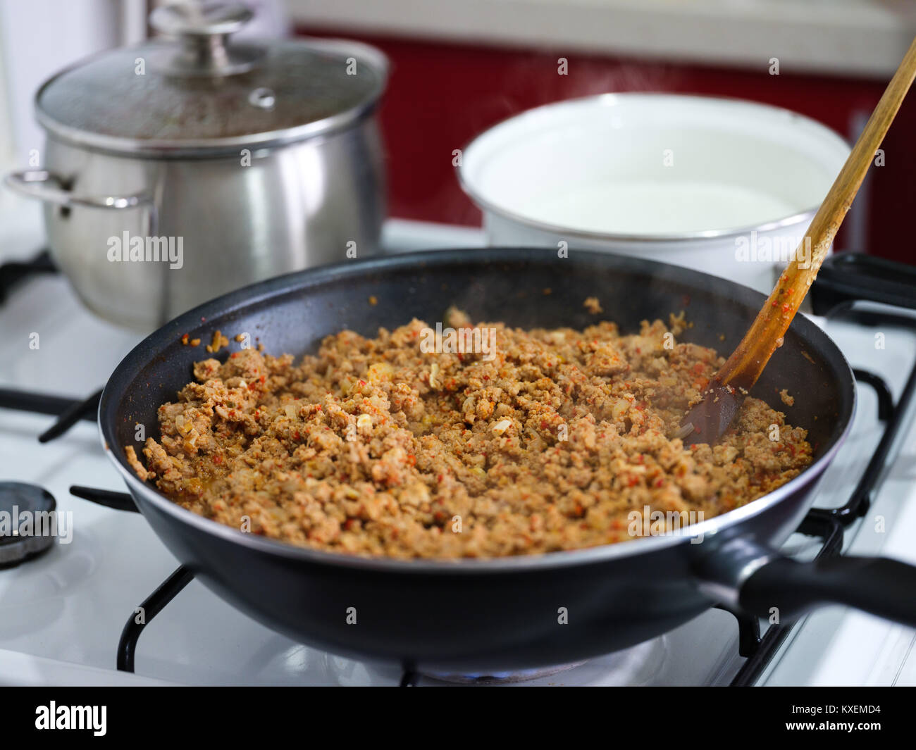 Minced beef and pork meat in the frying pan Stock Photo - Alamy
