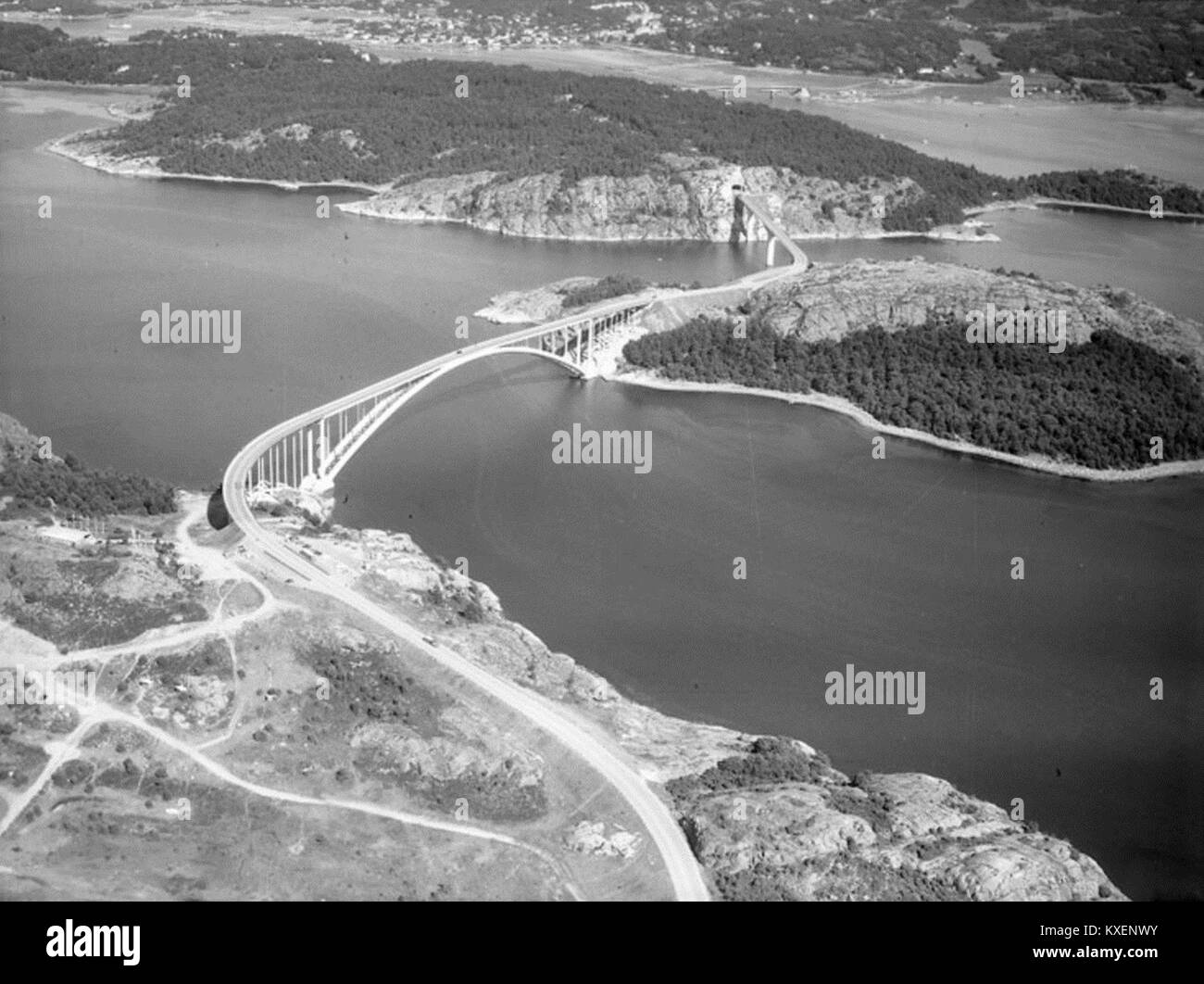 This historical photograph from 1962 captures the Alm Bridge ...