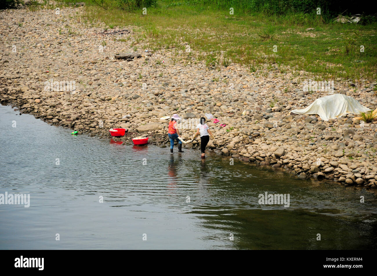 September 4, 2016. Wuyishan, China. Two chinese woman washing laundry ...