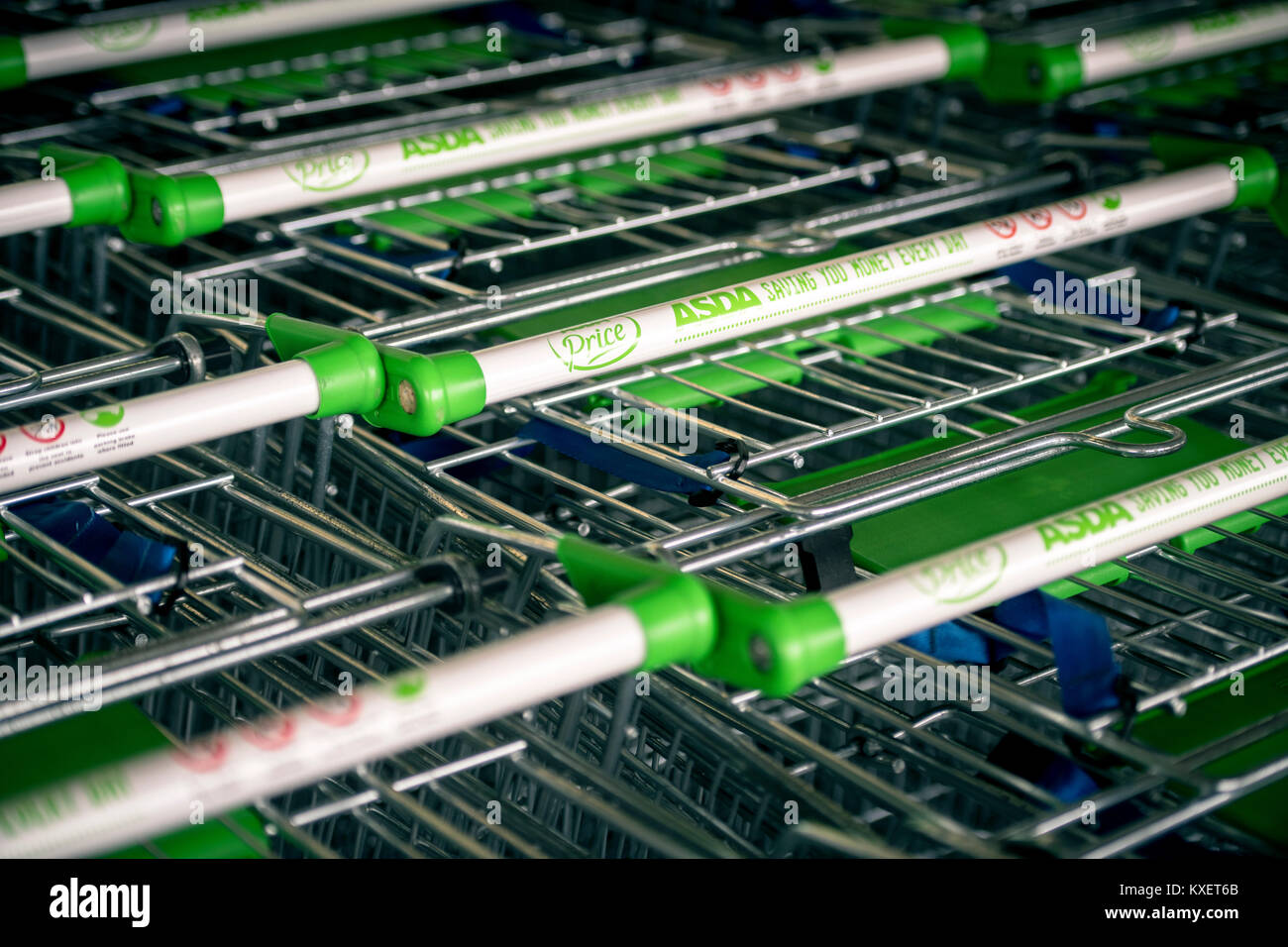 Asda supermarket trolleys stacked and ready for use Stock Photo - Alamy