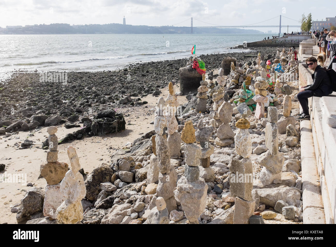 Painted stone sculptures on the beach along the waterfront promenade on ...