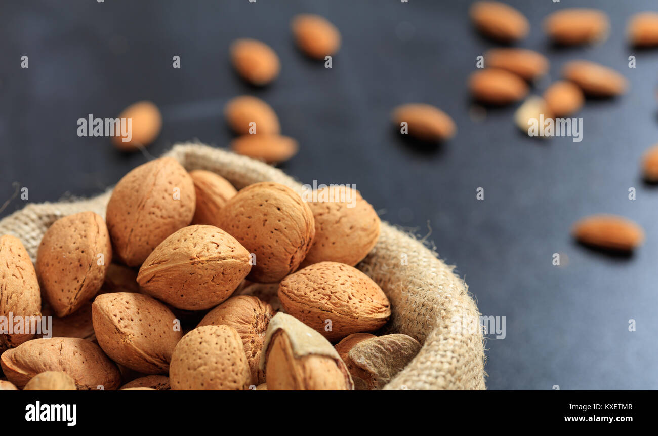Roasted raw peeled almonds hi-res stock photography and images - Alamy