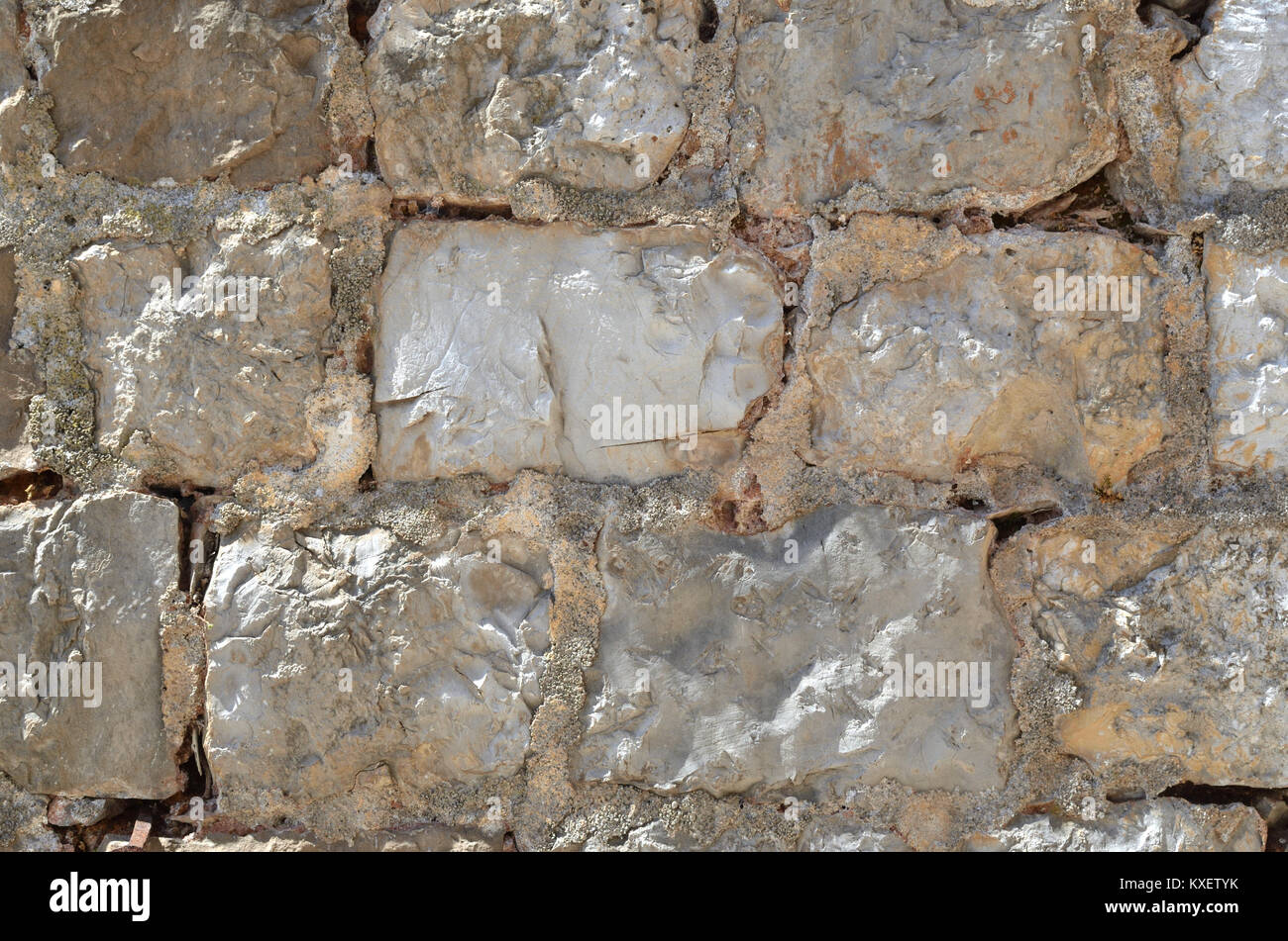 Rustic stone wall of a stall in coastal village Stock Photo - Alamy