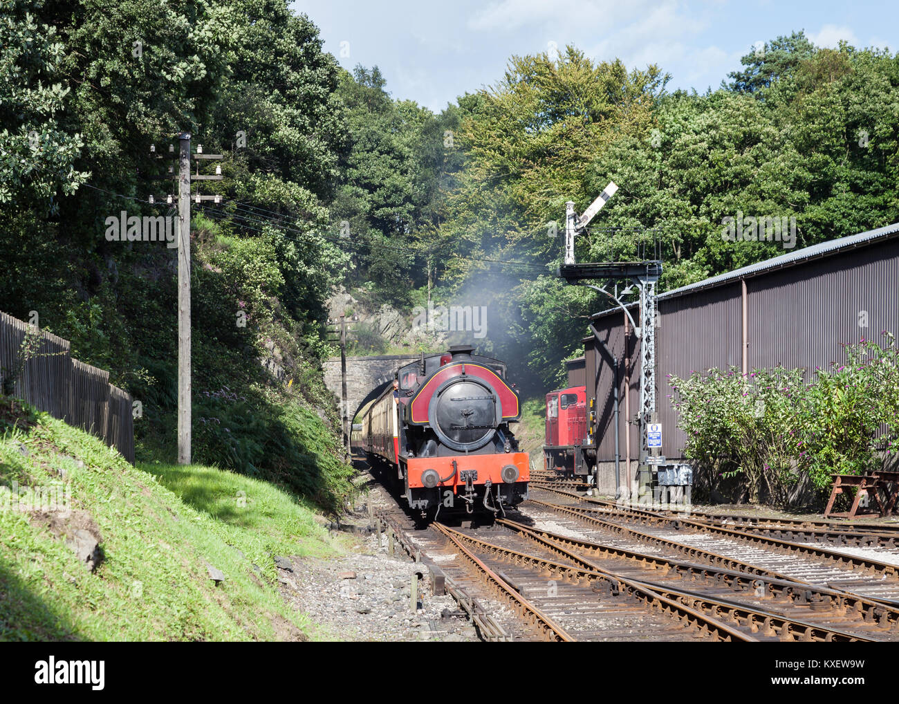 A preserved steam locomotive arrives in Haverthwaite Station. The ...