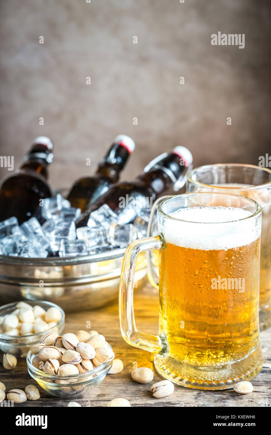 Appetizers and mugs of beer Stock Photo - Alamy