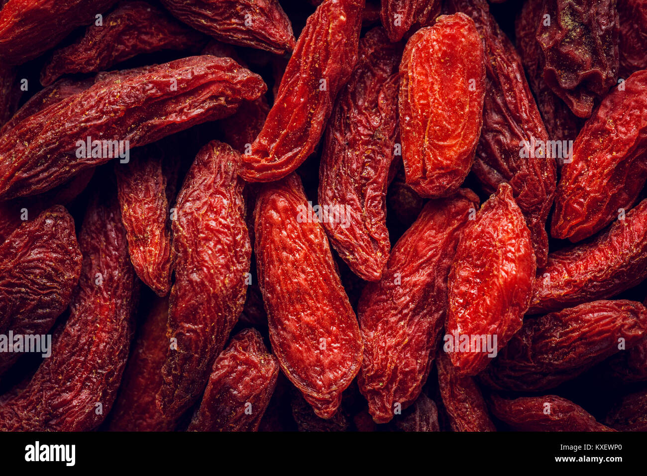 Dried goji berries macro background texture. Top view Stock Photo - Alamy