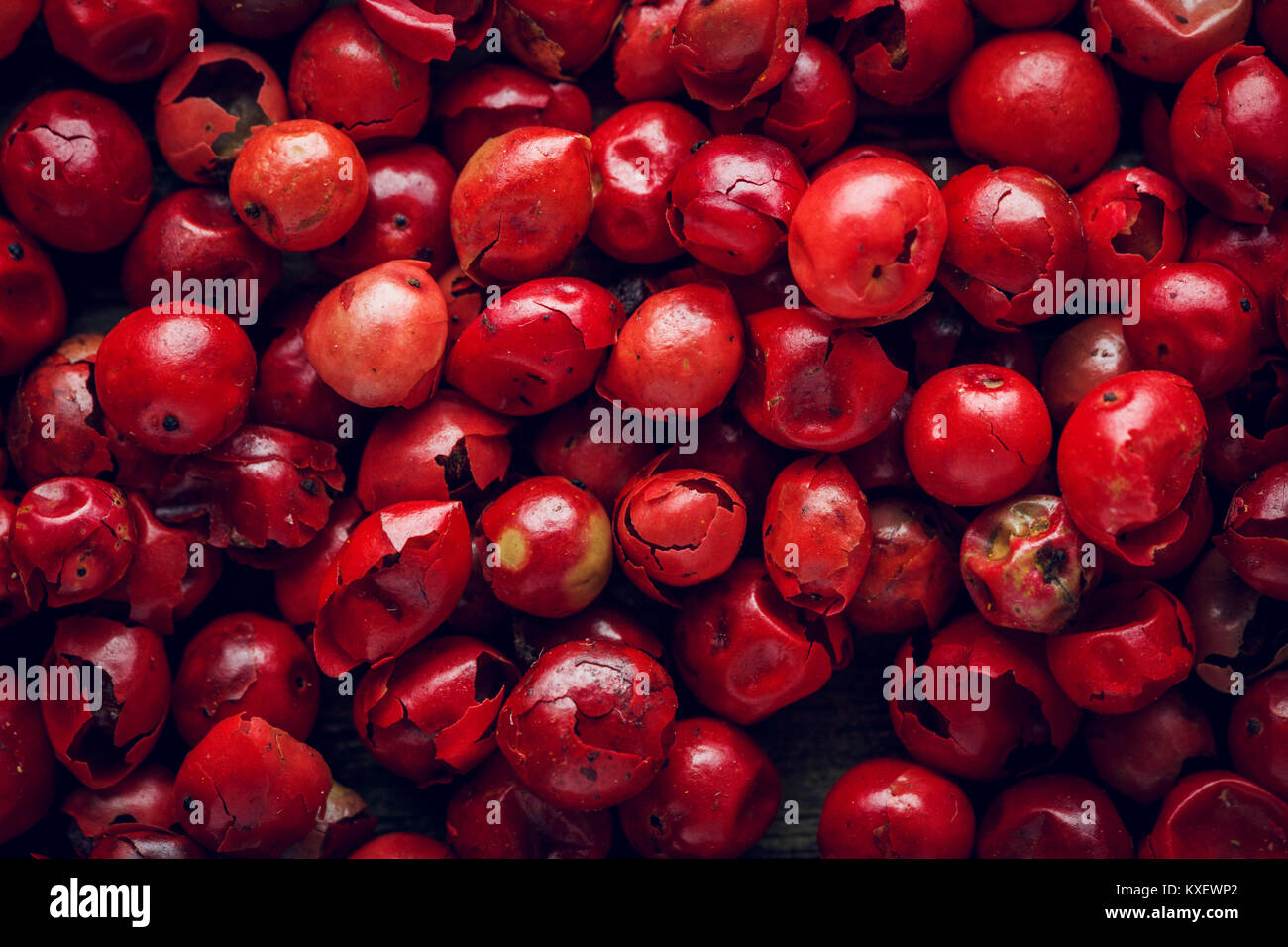Pink pepper macro background texture. Top view Stock Photo - Alamy