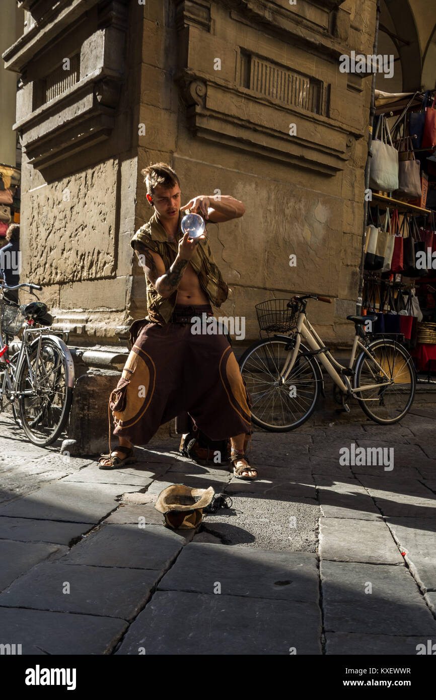 FLORENCE STREET PERFORMER WITH A CRYSTAL BALL Stock Photo - Alamy