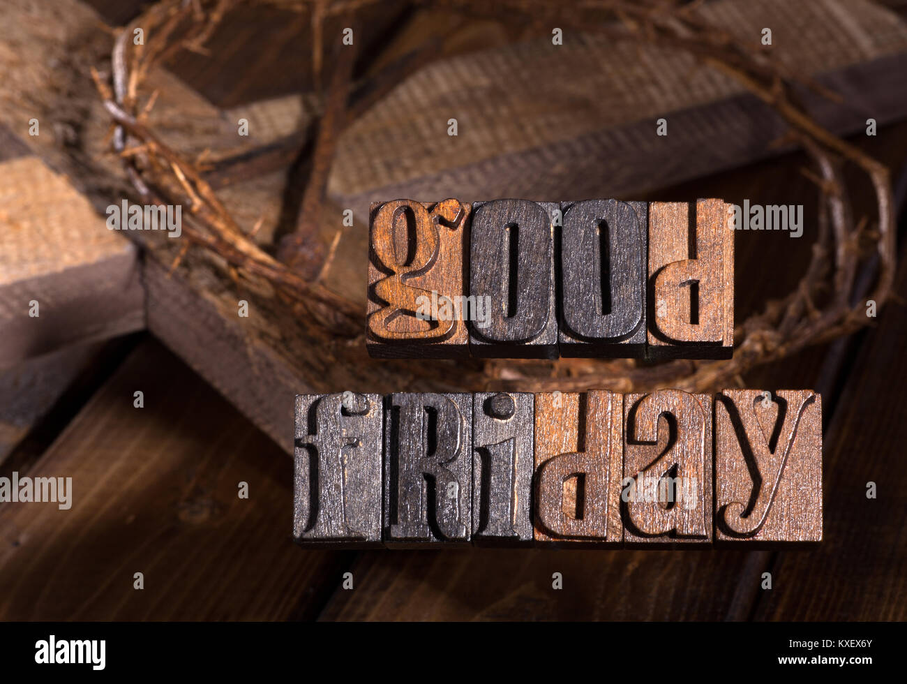 Good Friday text with crown of thorns and cross in background Stock ...