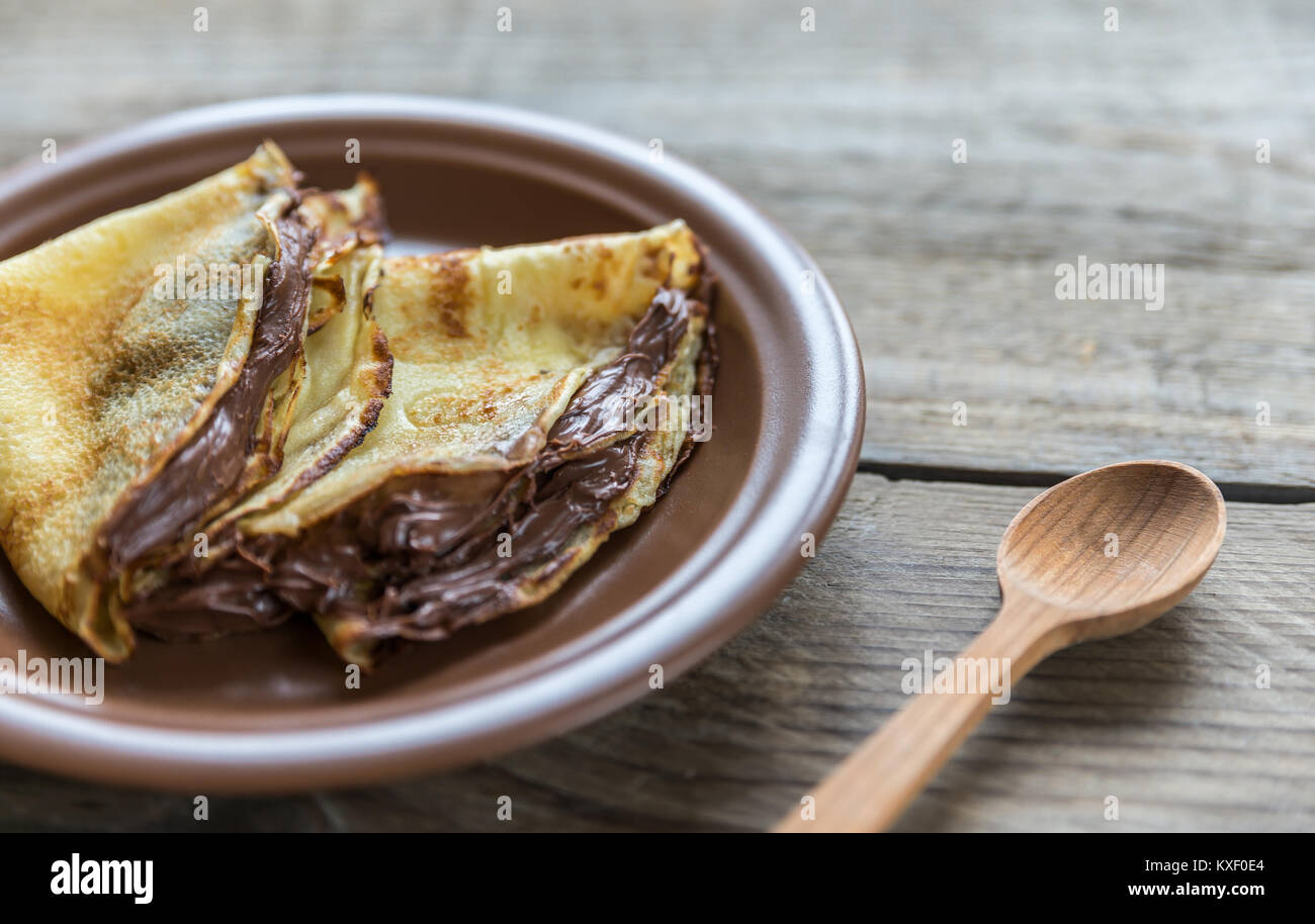 Crepes dark chocolate sauce hi-res stock photography and images - Alamy