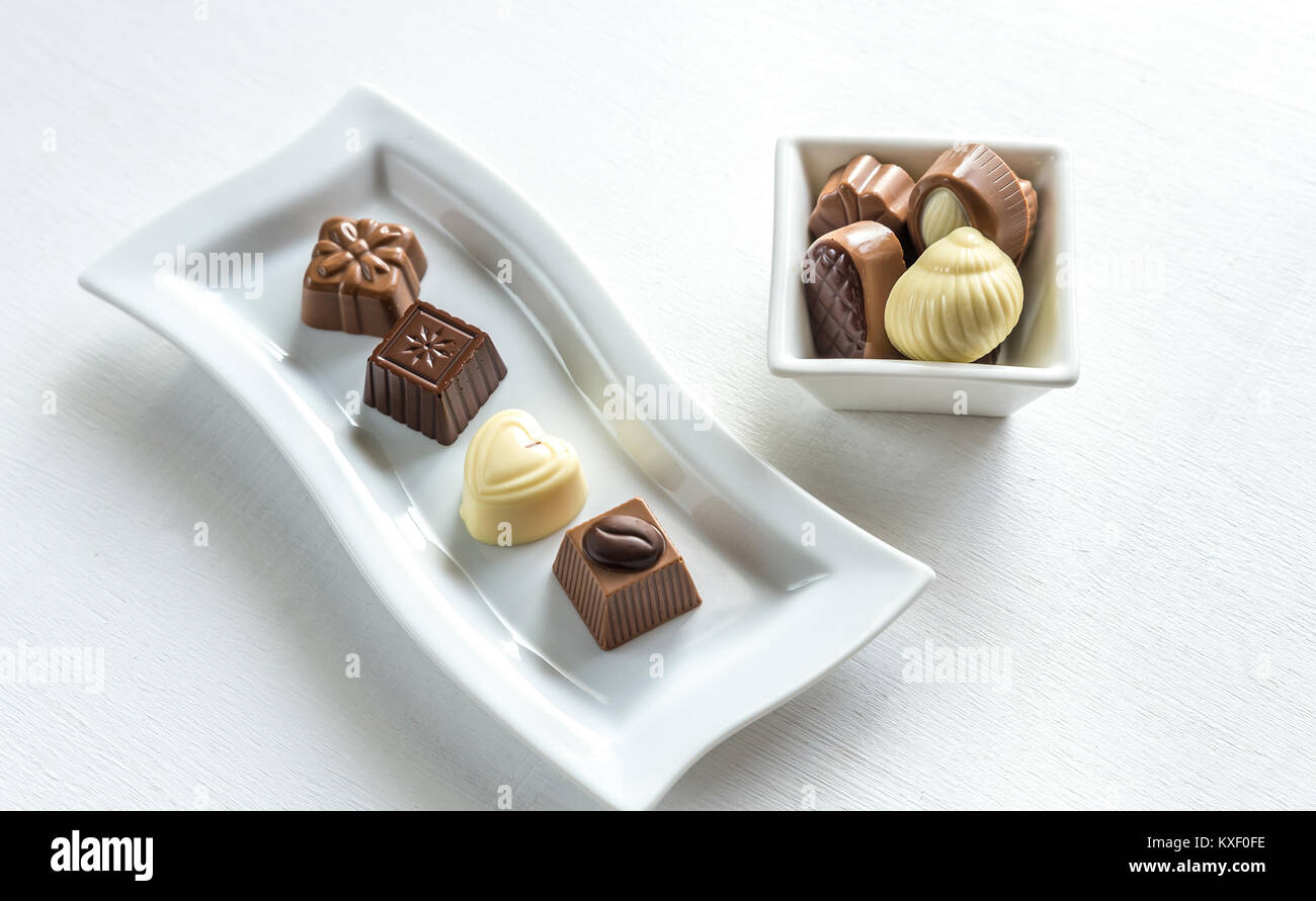 Chocolate candies of different shapes Stock Photo - Alamy