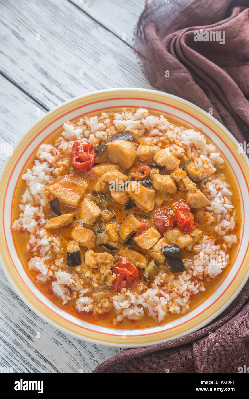 Thai red chicken curry with white rice Stock Photo - Alamy