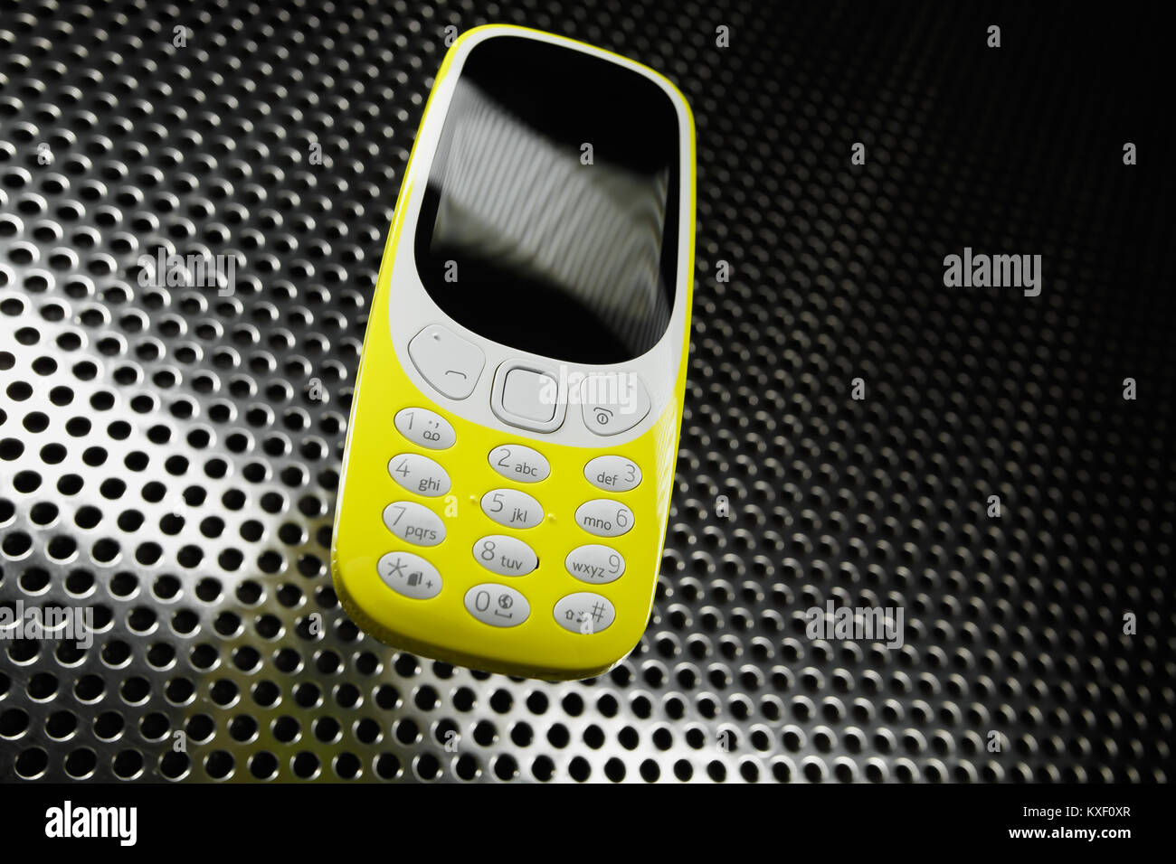 Shockproof phone on metal surface Stock Photo - Alamy