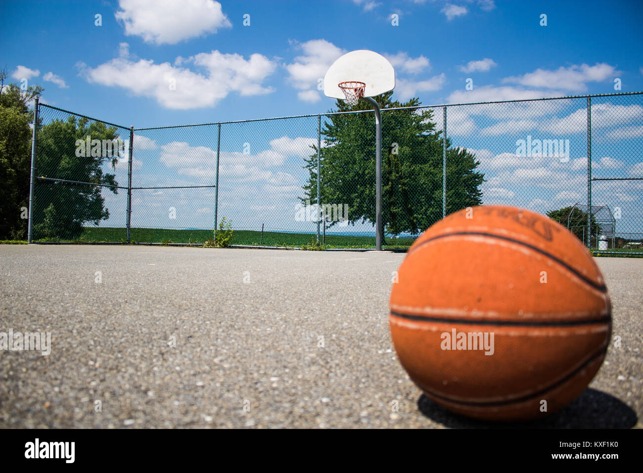 A basketball on a basketball court Stock Photo - Alamy