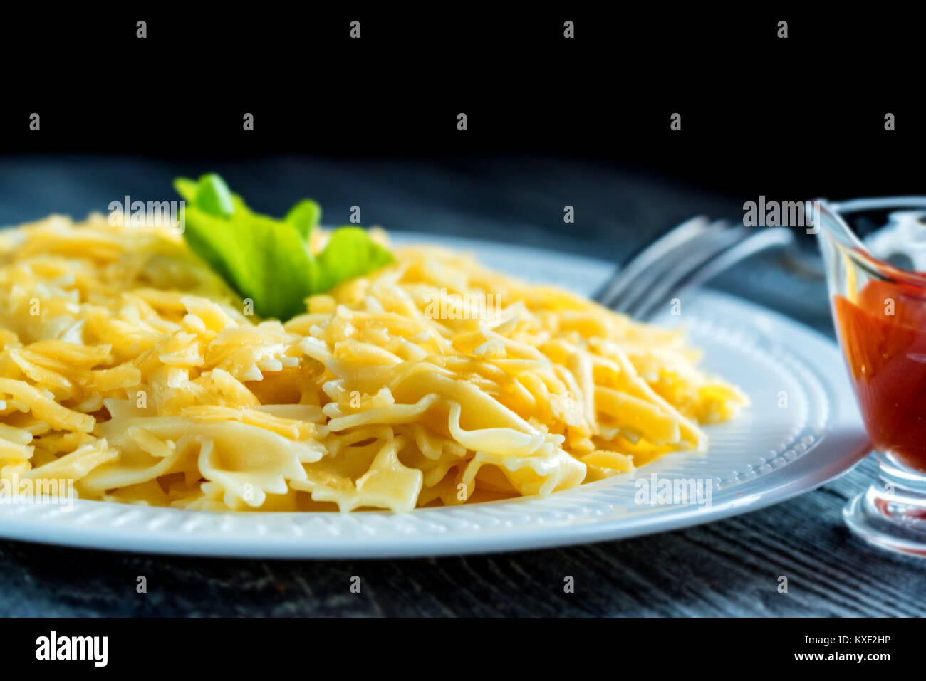 Traditional Italian pasta or fussili with cheese Stock Photo - Alamy