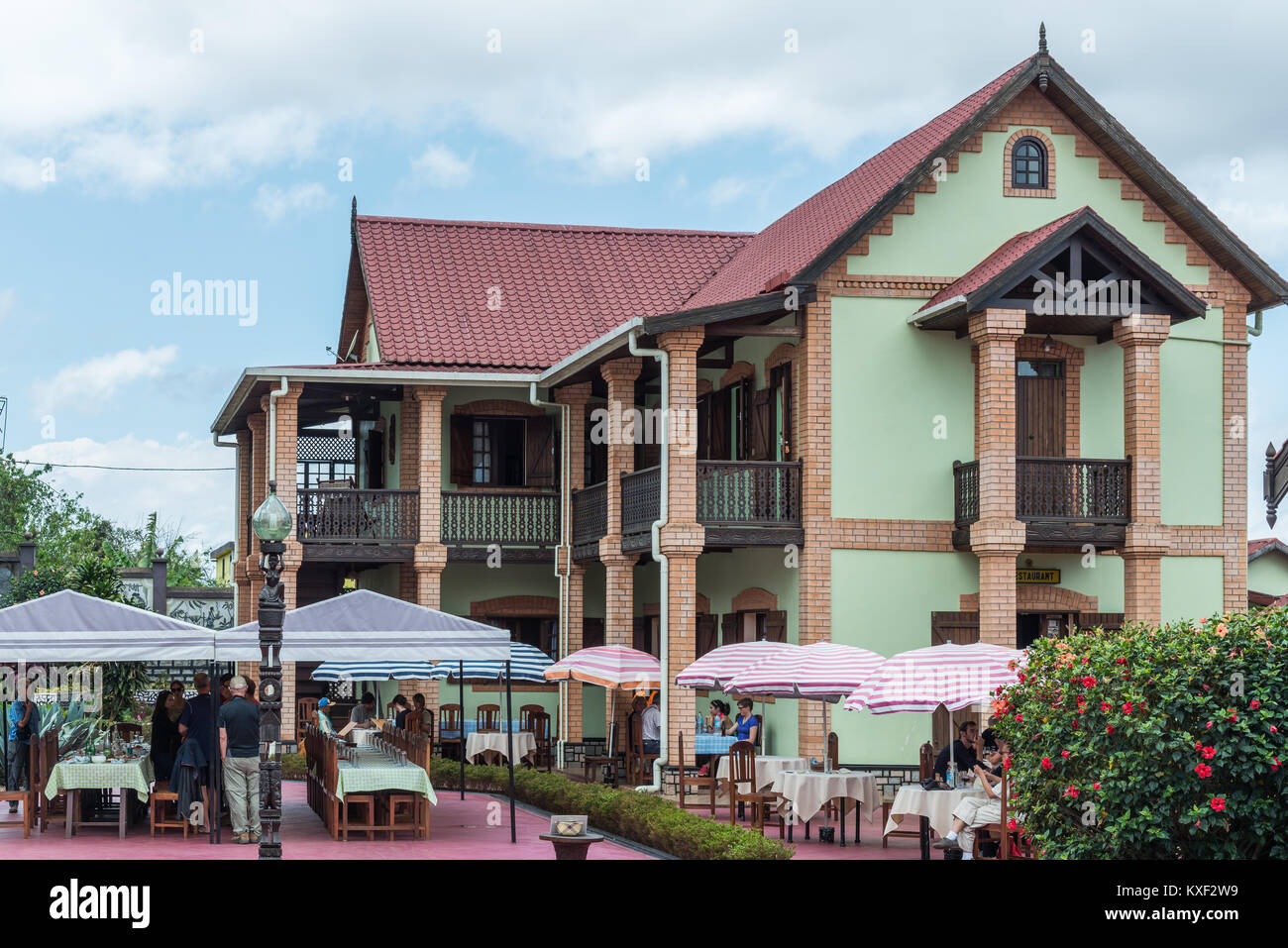 An open air restaurant with tents and umbrellas. Madagascar, Africa ...