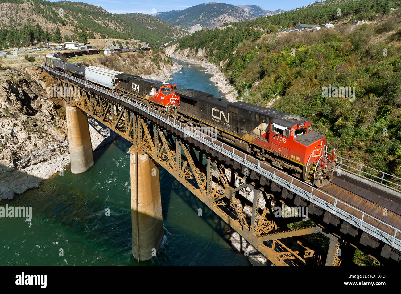 CNR manifest freight westbound led by loco IC 2708 over Lytton Bridge ...