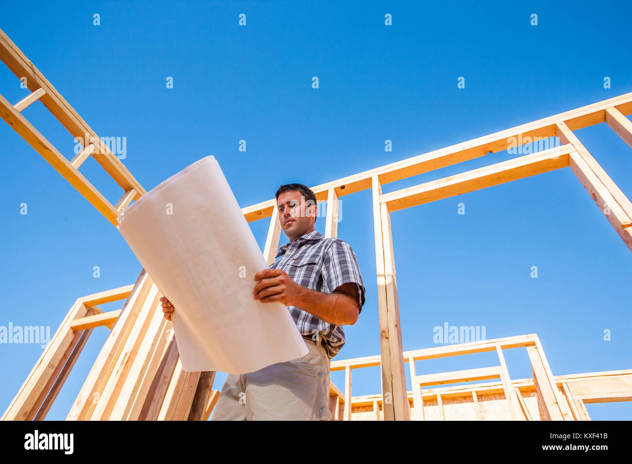 Construction workers checking plans hi-res stock photography and images ...