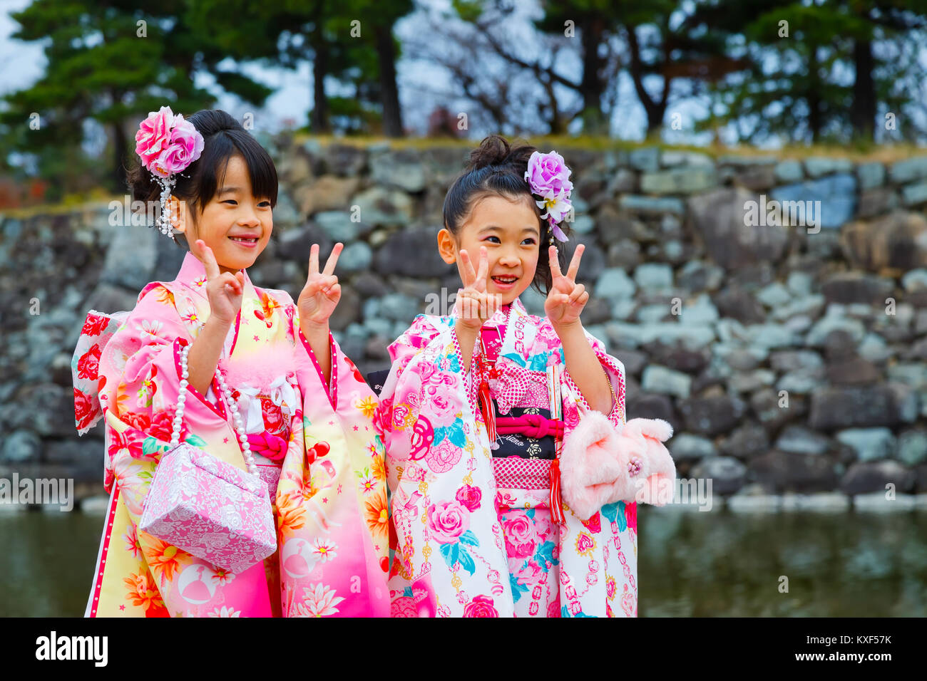 MATSUMOTO, JAPAN - NOVEMBER 21, 2015: Children at Atsuta shrine in a ...