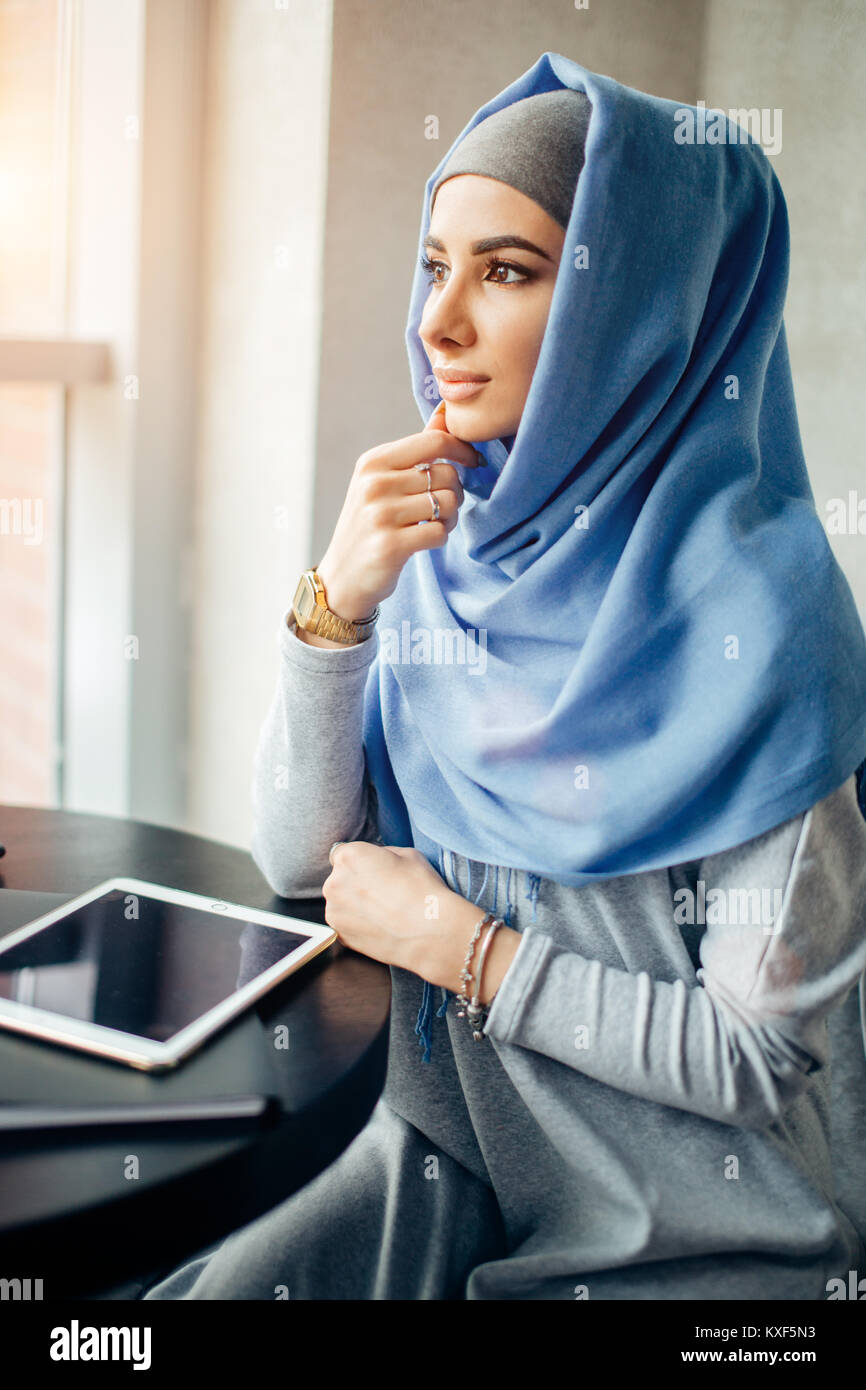 pretty muslim girl in hijab in cafe Stock Photo - Alamy