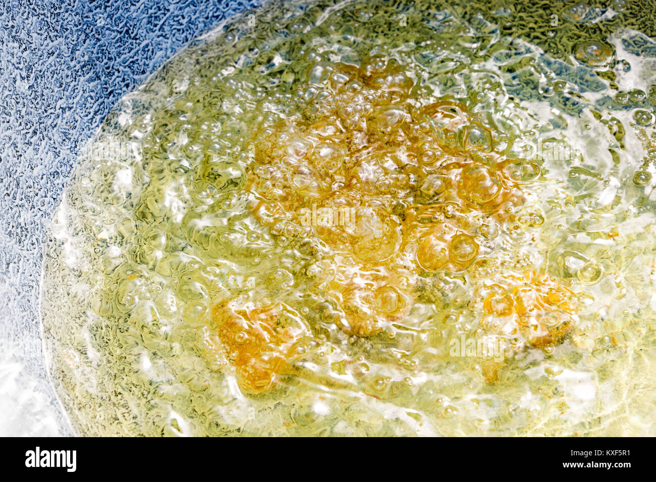 Boiling oil in pan for cooking street food Stock Photo - Alamy