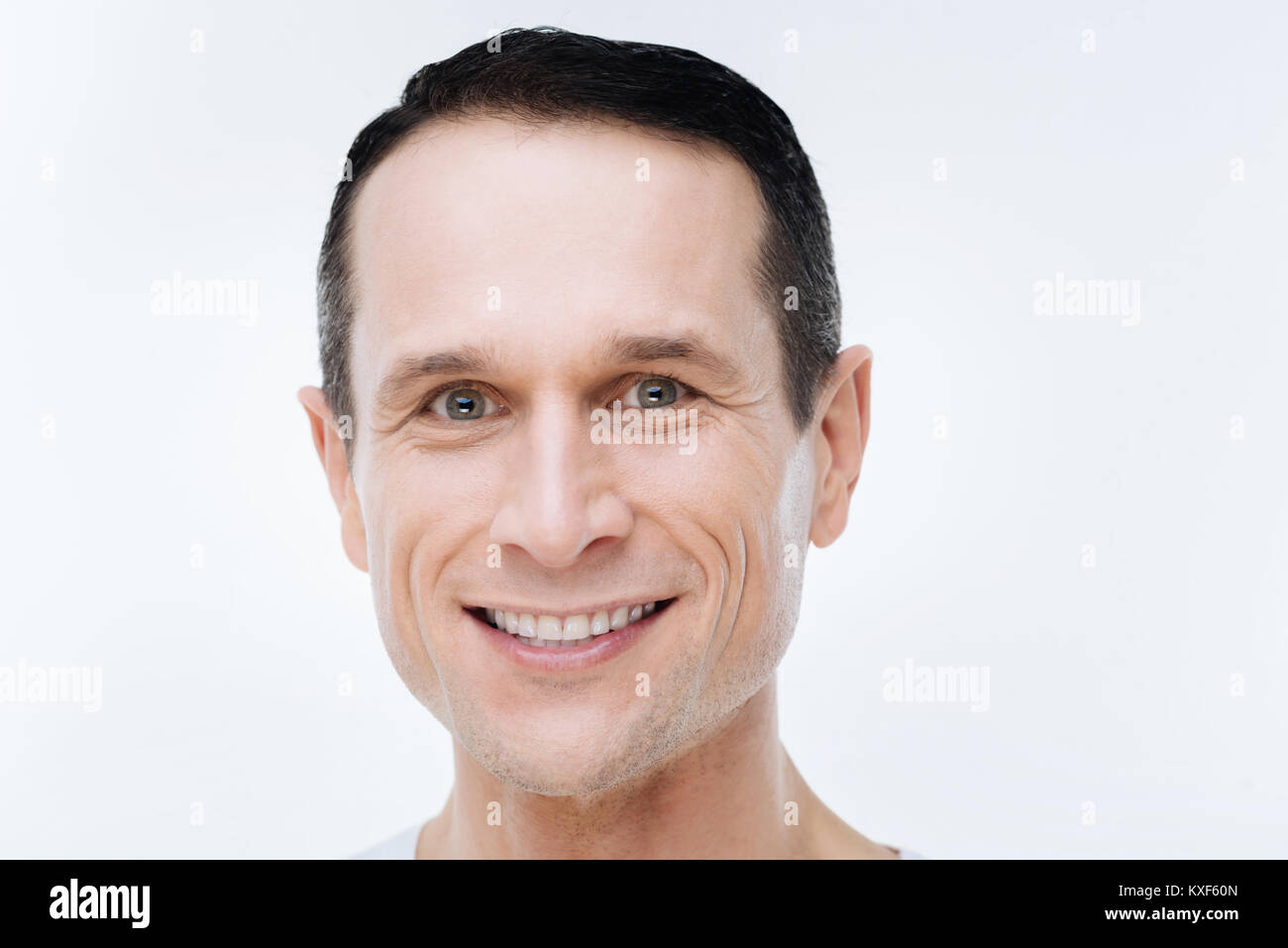 Portrait of a happy delighted man Stock Photo - Alamy