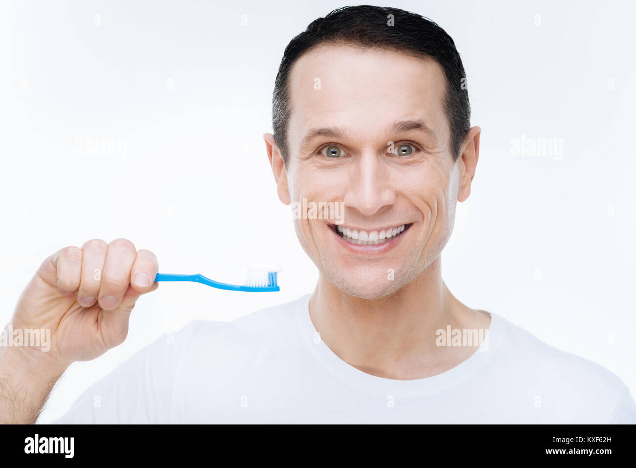 Cheerful nice man showing his smile Stock Photo - Alamy