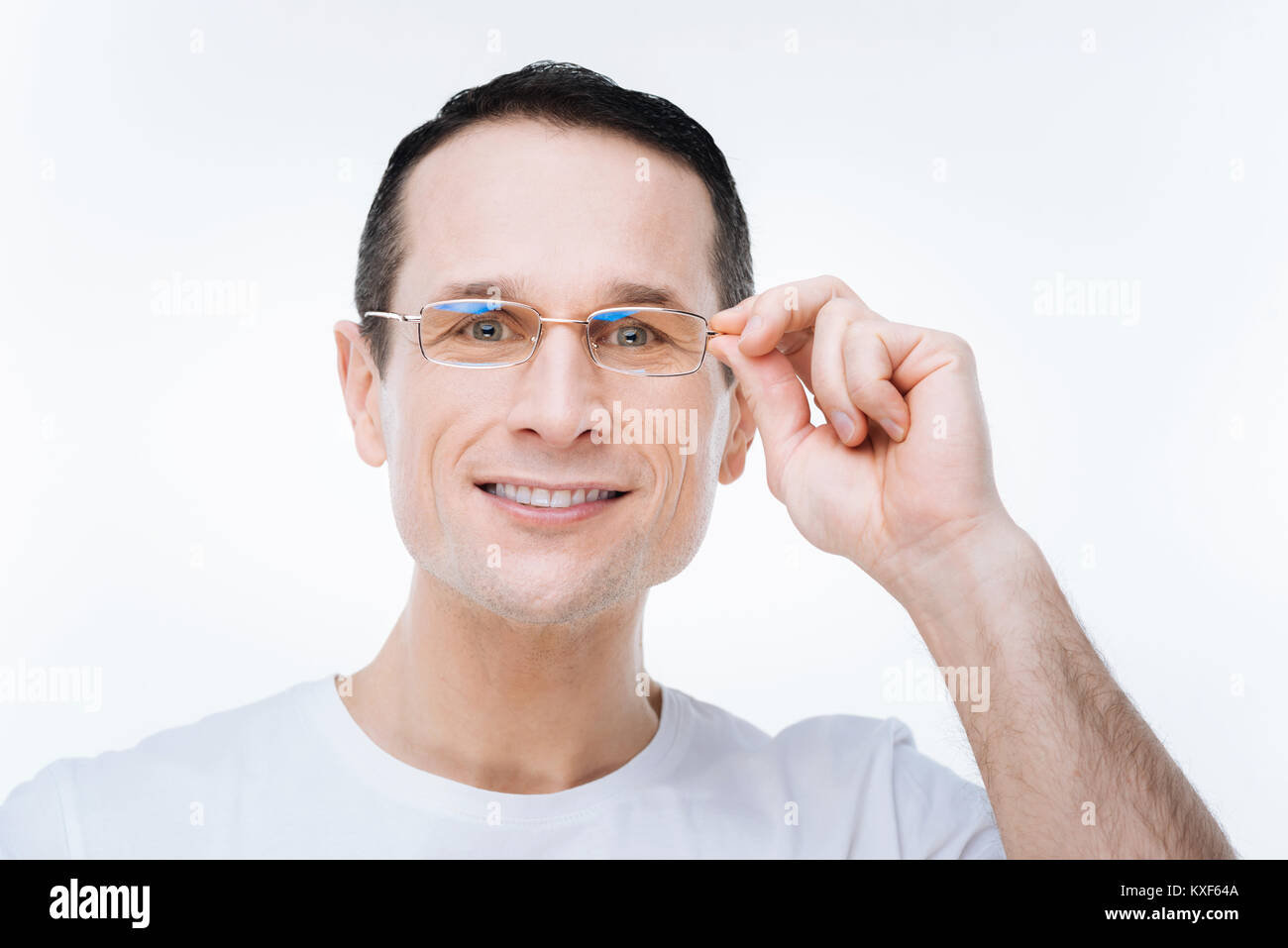 Portrait of a positive smart man smiling Stock Photo - Alamy