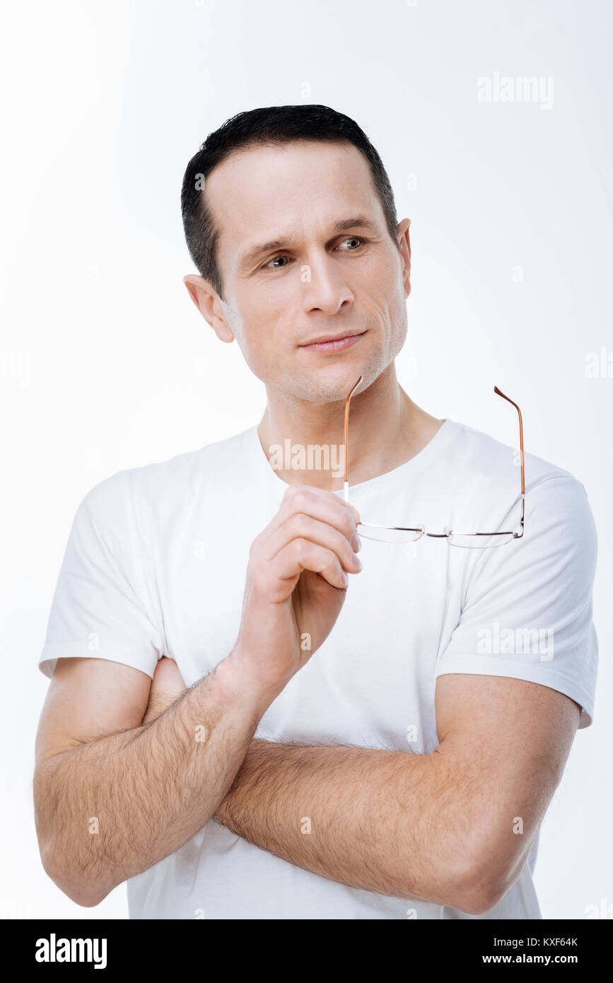 Nice smart man looking for a solution Stock Photo - Alamy