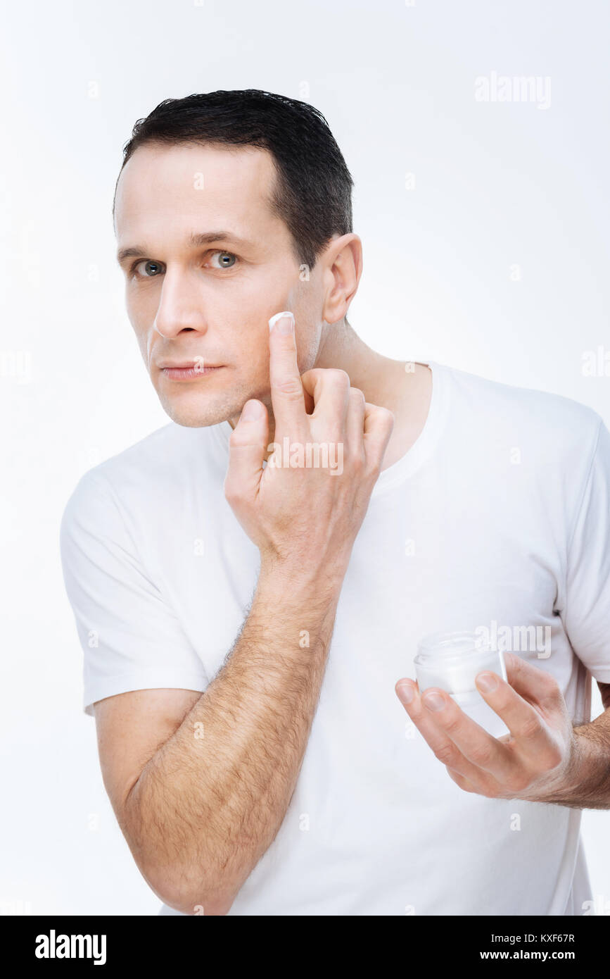 Cheerful handsome man using smart hi-res stock photography and images ...