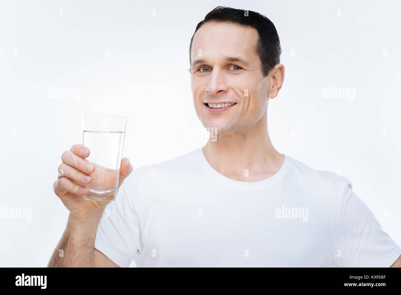 Delighted healthy man leading healthy lifestyle Stock Photo - Alamy